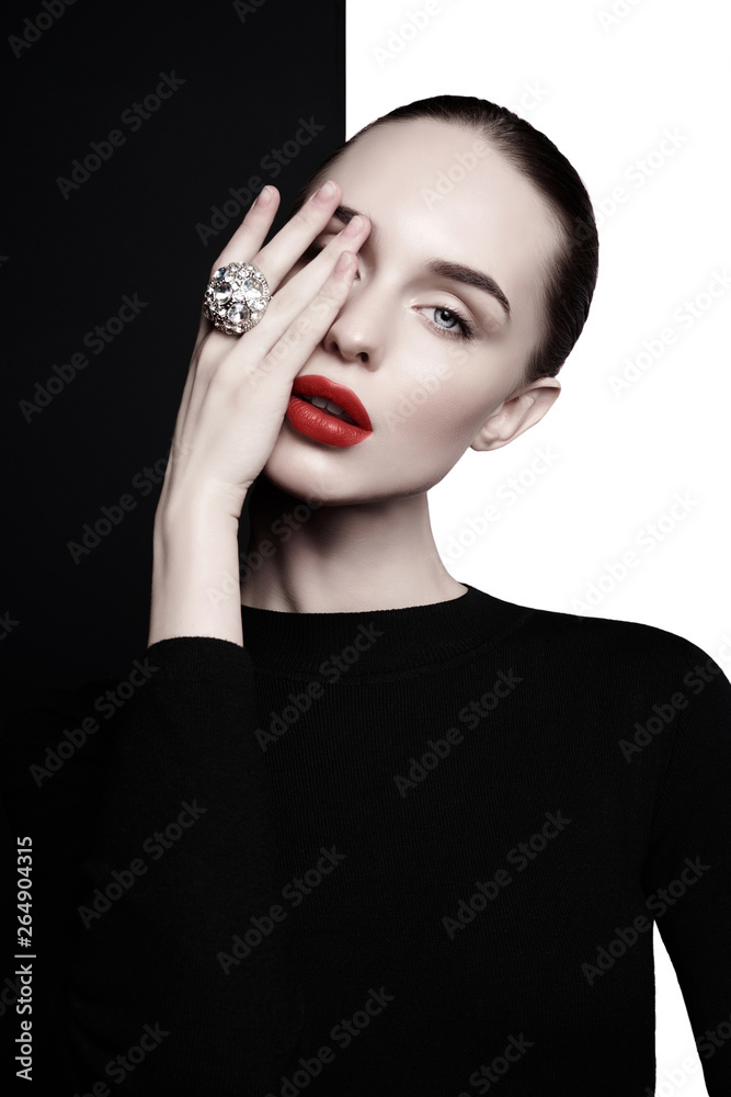 beautiful young woman with big ring pose in studio Stock Photo | Adobe ...
