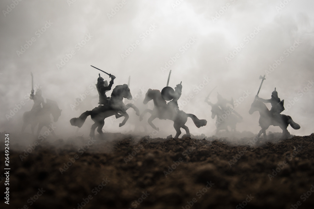 Medieval battle scene with cavalry and infantry. Silhouettes of figures ...