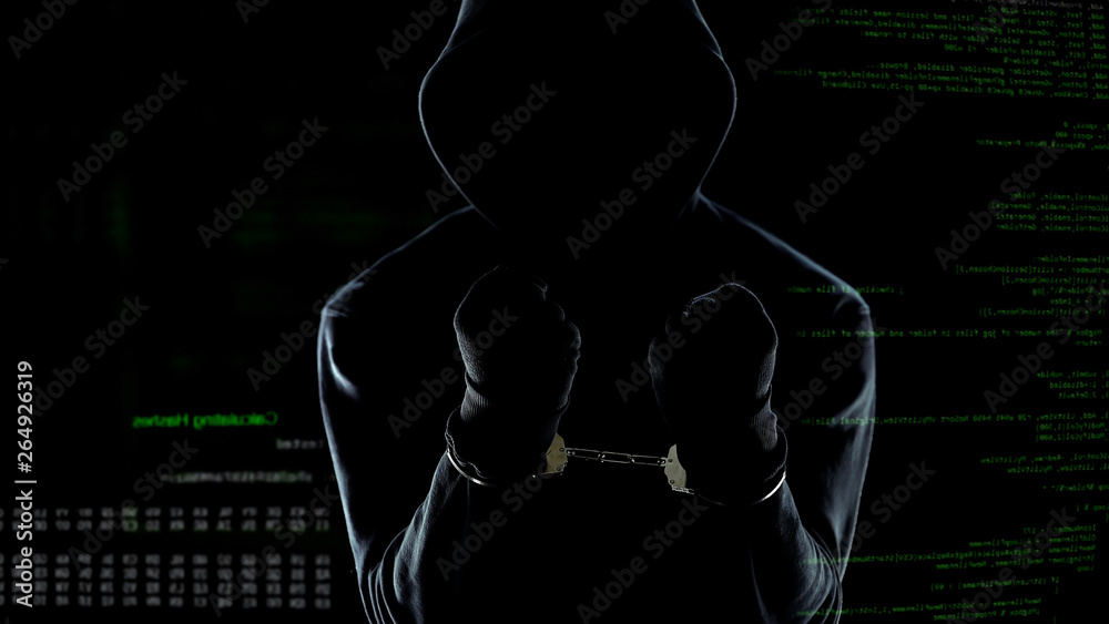 Silhouette of handcuffed anonymous standing in front of animated ...