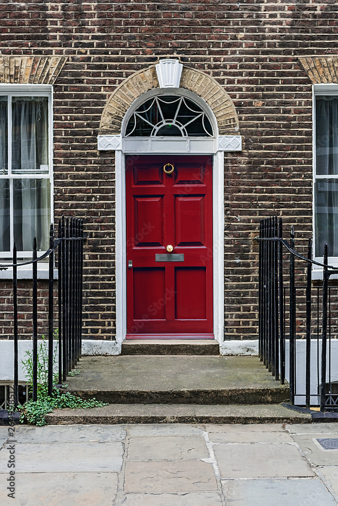 Little red door on a classic London terrace house. Stock Photo | Adobe ...