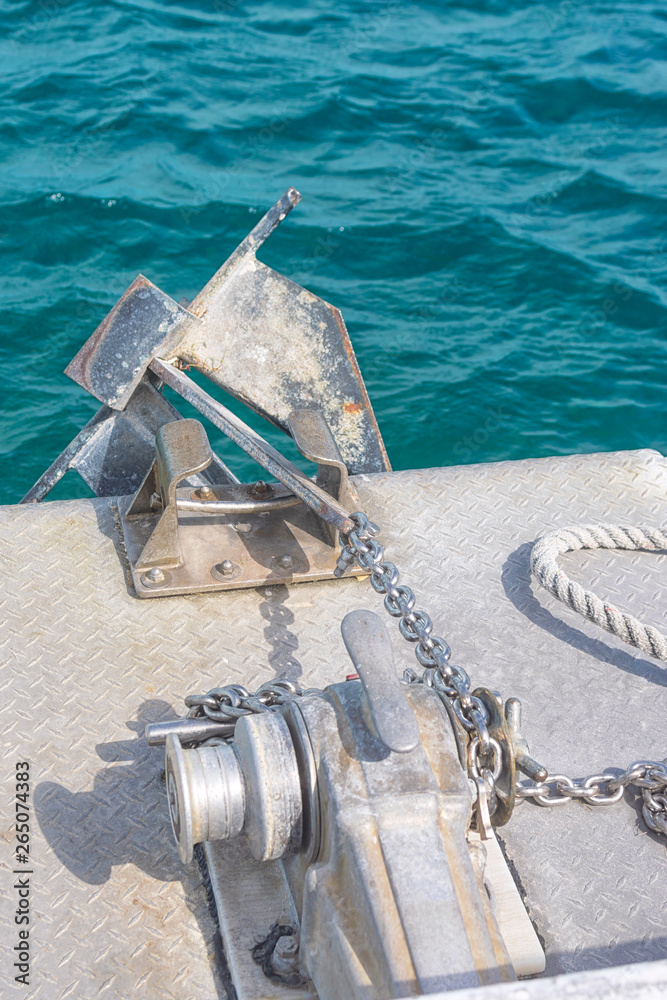 Anchor and mechanism for lifting the anchor with a metal chain Stock ...
