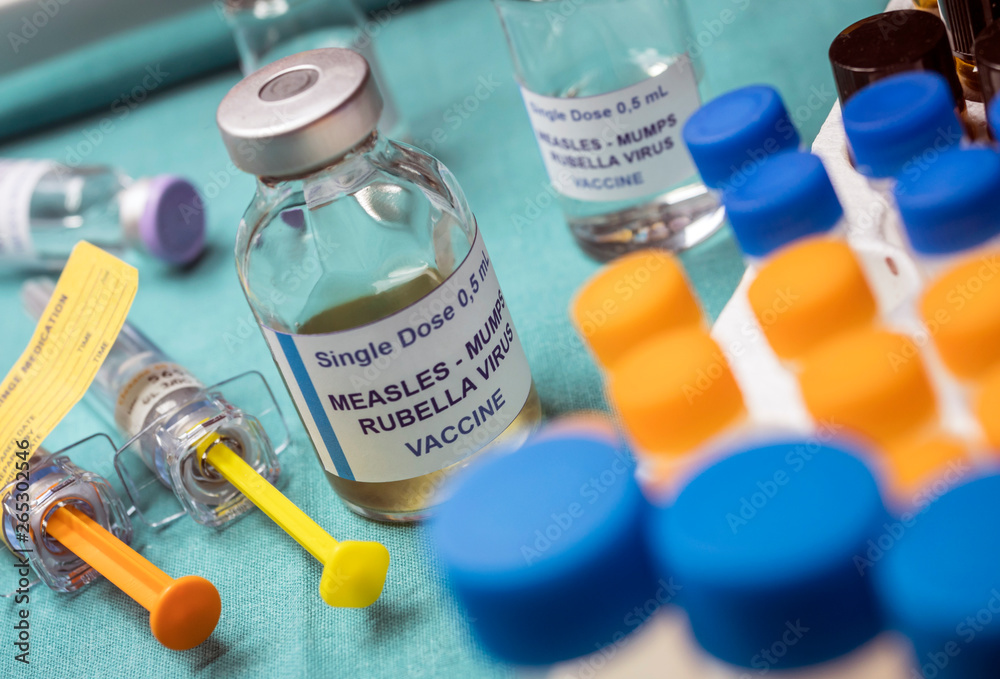 Different vials of triple viral vaccine of measles, rubella and mumps ...
