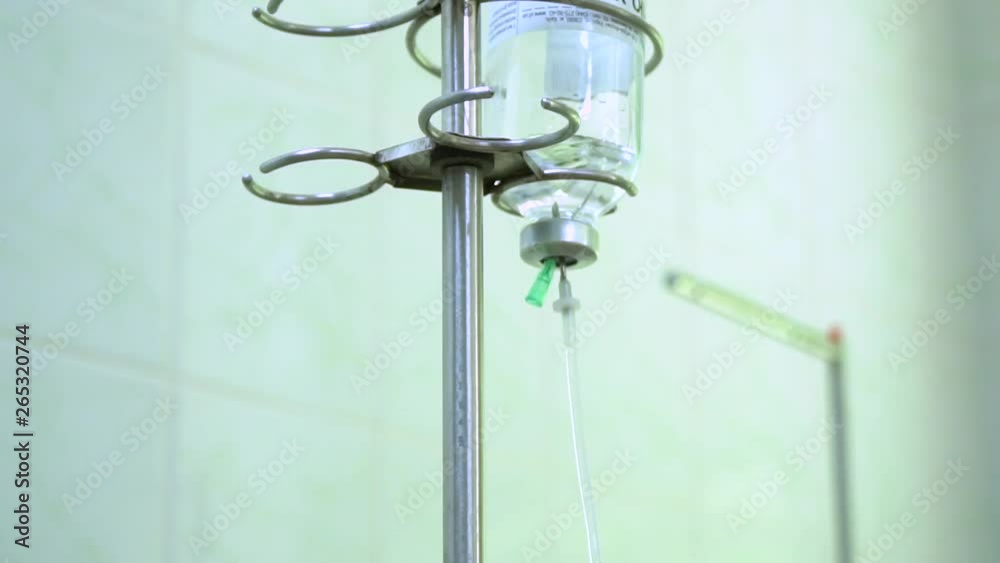 Intravenous injection. Infusion of the drug into a vein through an IV ...
