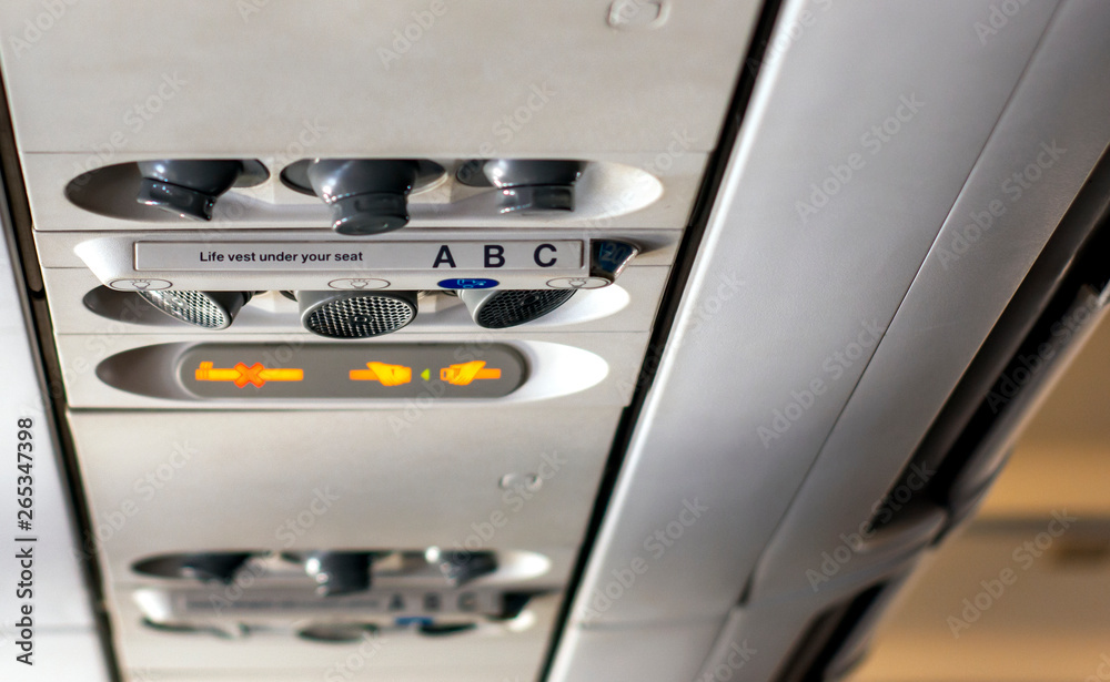Control panel inside a flight cabin of an airplane Stock Photo | Adobe ...