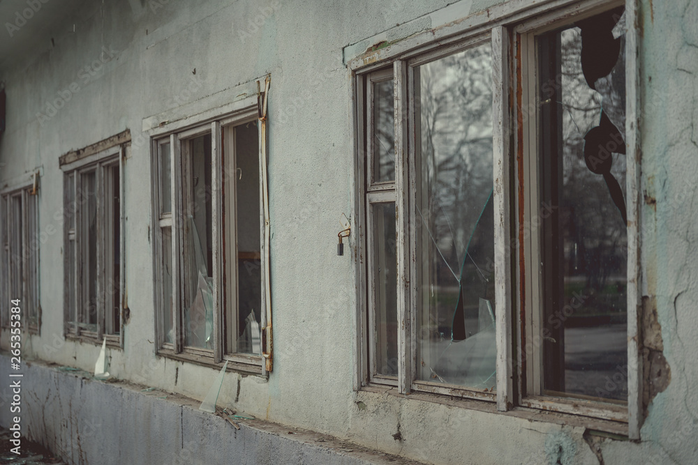 Window with broken glass in old building Wooden window frame with ...