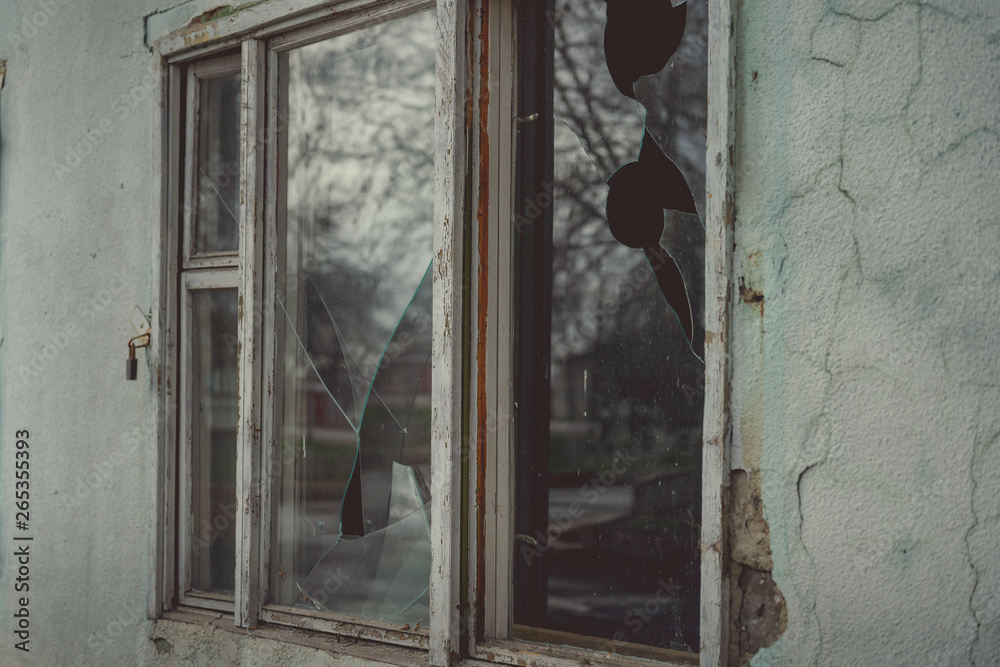 Window with broken glass in old building Wooden window frame with ...