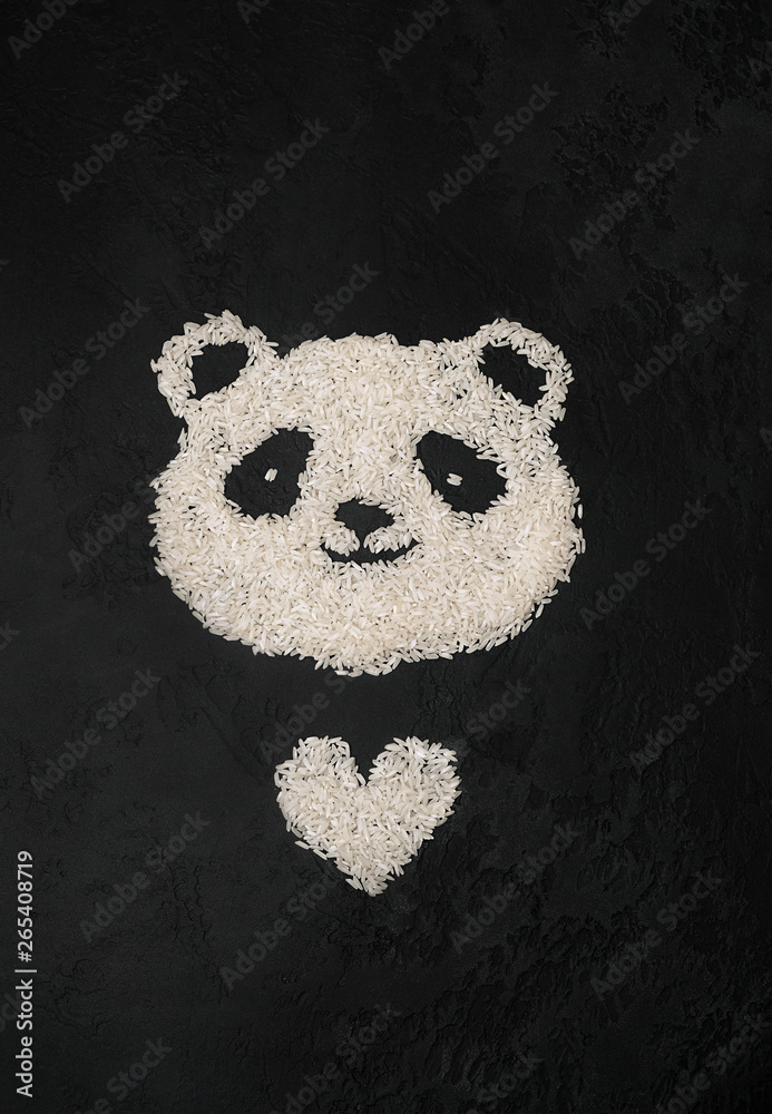 Panda, symbol of China, face made in rice on dark background. Asia ...