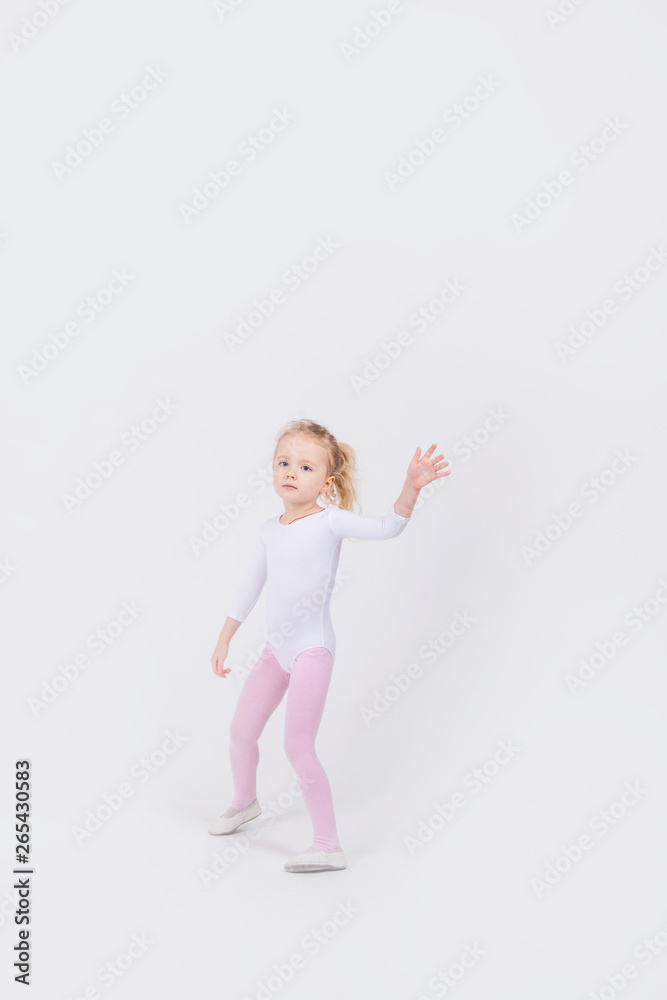 Happy little girl dancing isolated on white background Stock Photo ...