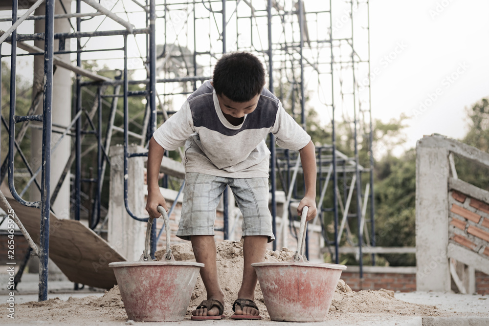 Child labor in building commercial building structures. Stock Photo ...