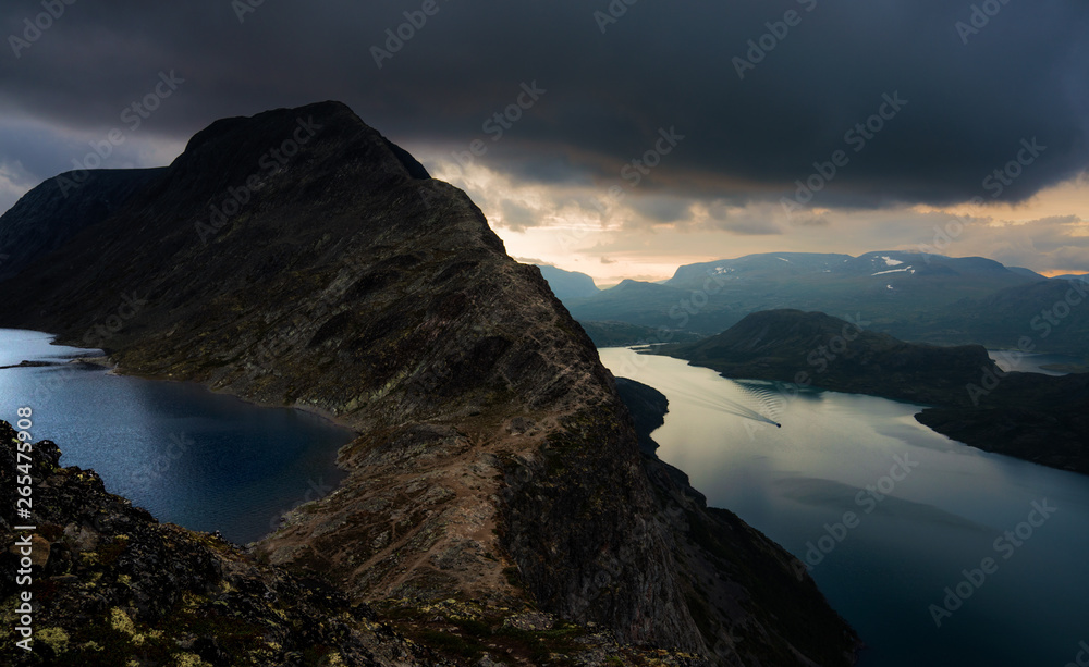 Dramatic Mountain Landscape. Sunrise after a storm. Dark stormy clouds ...