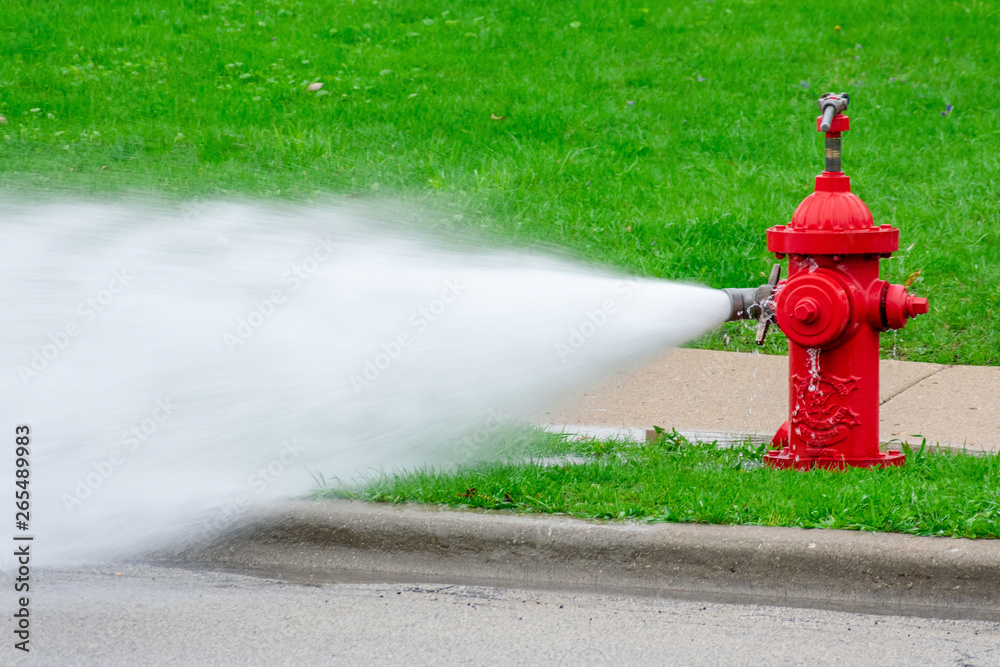 Closeup of red fire hydrant with high pressure spray Stock Photo ...