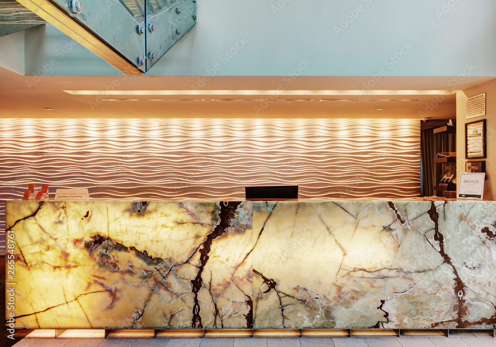 Marble reception desk in hotel lobby Stock Photo | Adobe Stock