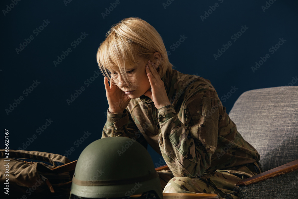 Close up portrait of young female soldier. Woman in military uniform on ...