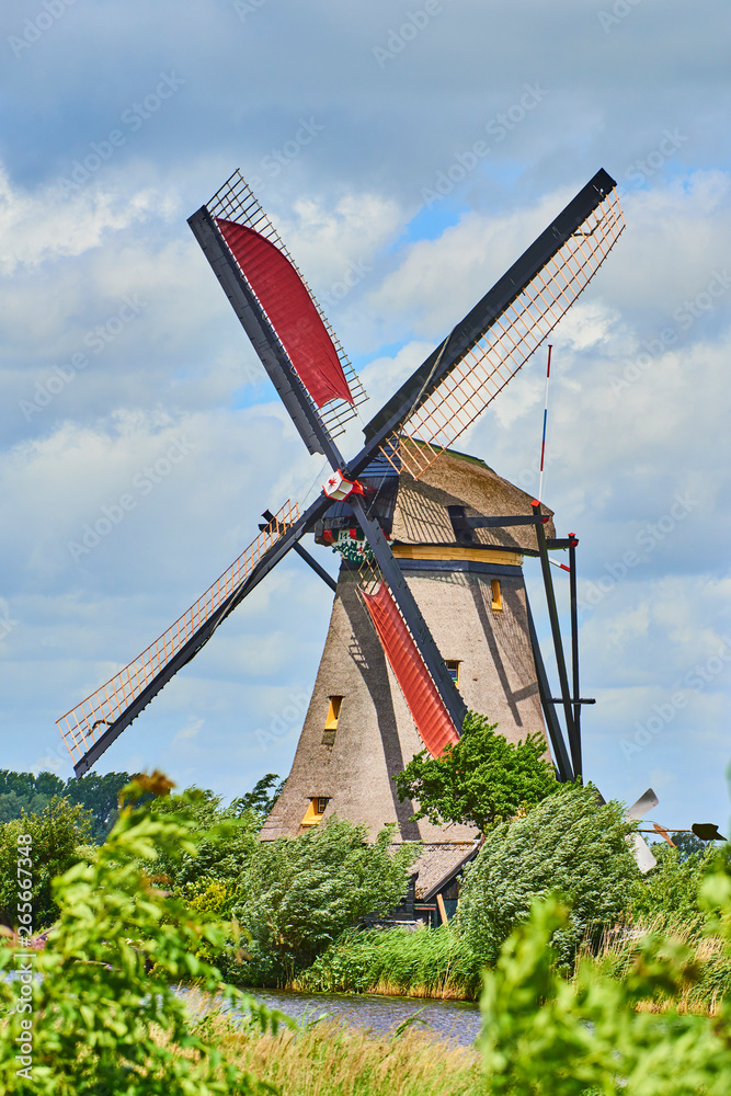 Netherlands rural lanscape with windmills at famous tourist site ...