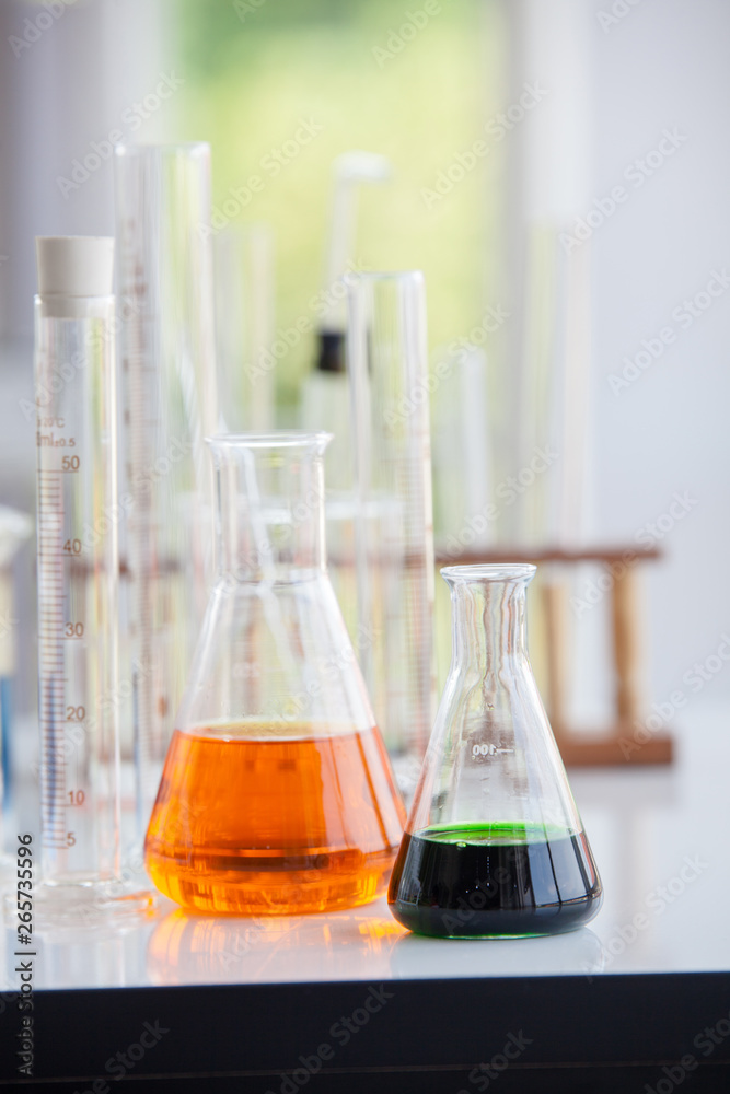 Assorted laboratory glassware equipment ready for an experiment in a ...