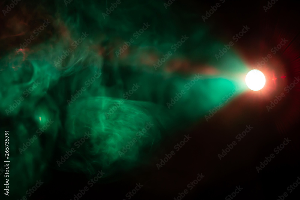 projector spotlight green color , smoke texture background . light beam ...