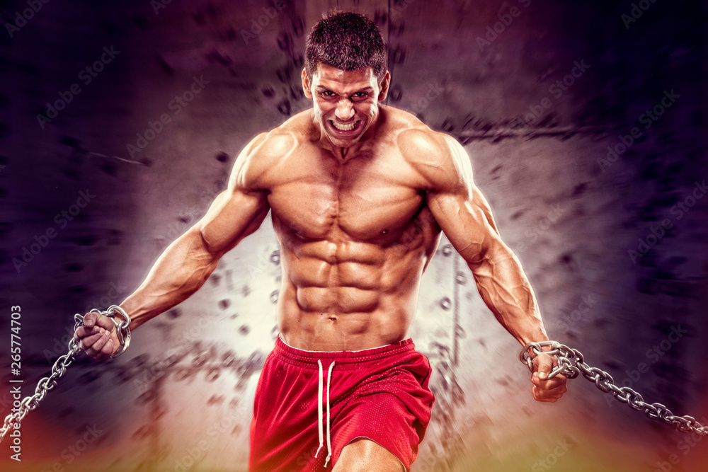 Photo HERCULES, Handsome Muscular Men in Chains. Trying to brake them ...