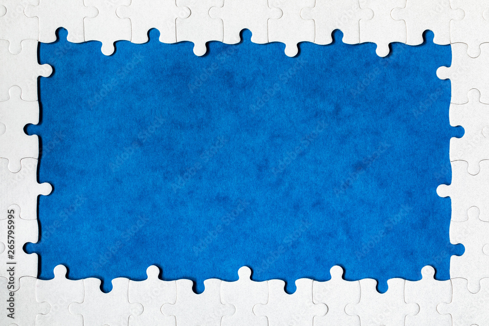 Framing in the form of a rectangle, made of a white jigsaw puzzle ...
