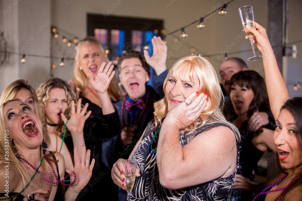 Trans Woman with Friends at a Party Stock Photo | Adobe Stock