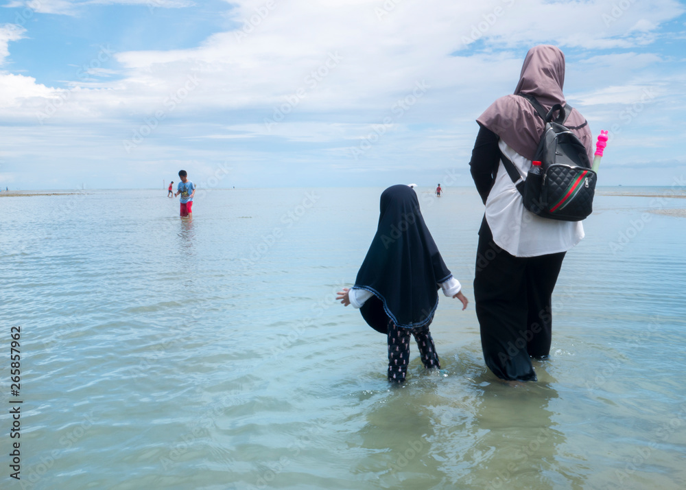 Muslim Woman on Halal Tourism Destination, Beach and Blue Ocean Stock ...