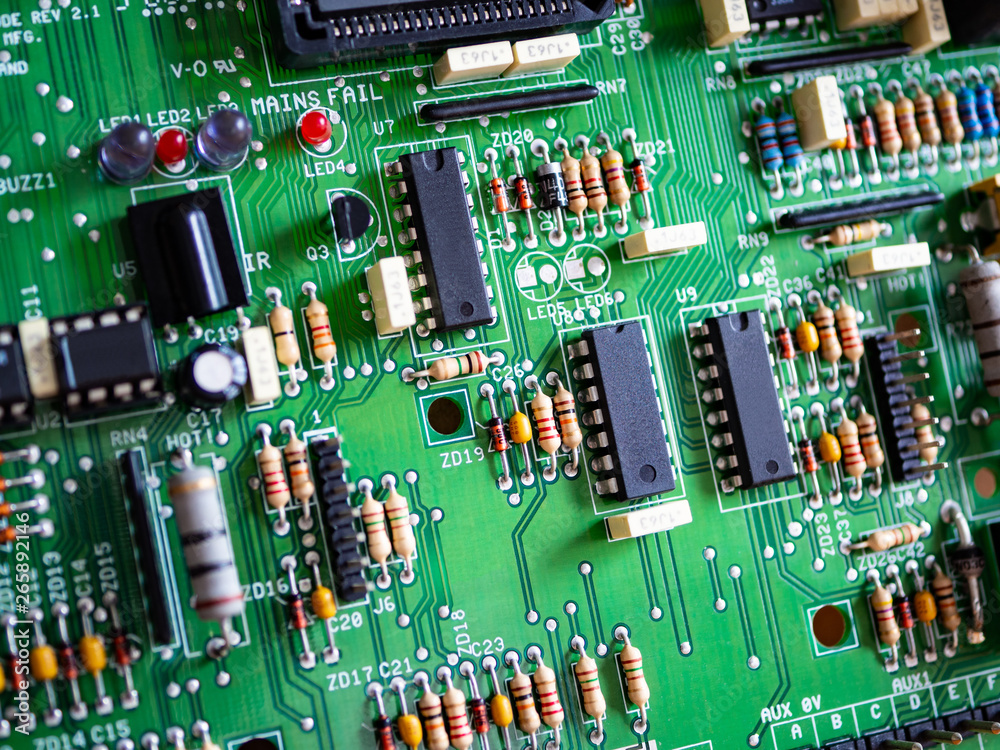Close-up of printed electronic circuit board with processor and many ...