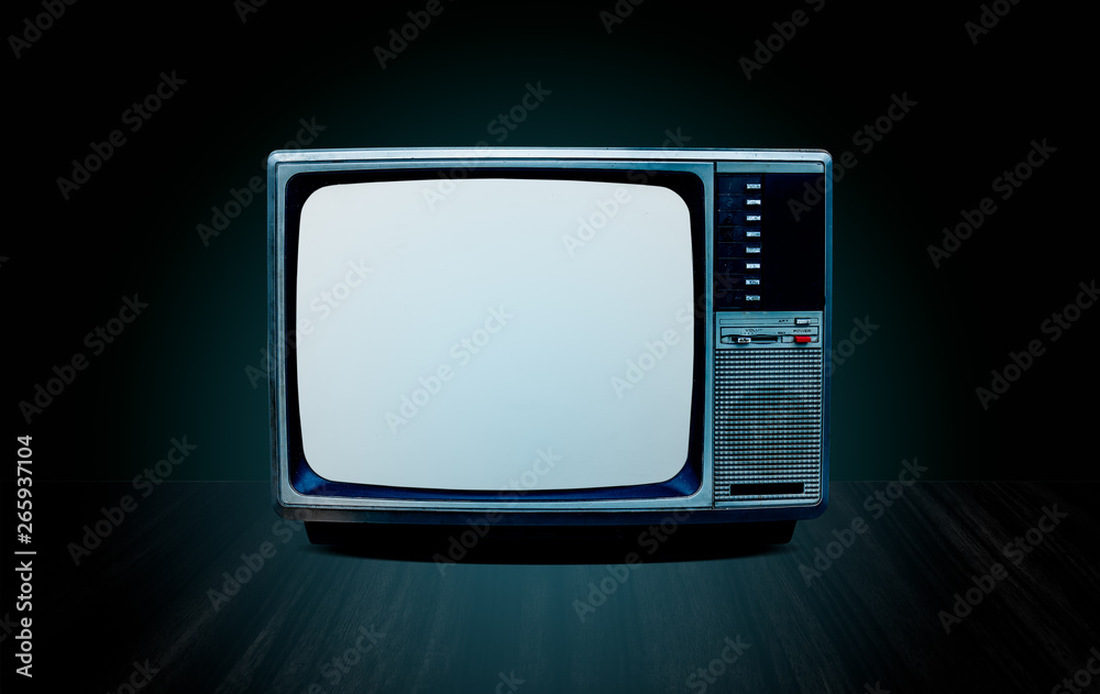 vintage old television receiver on table front gradient green wall ...