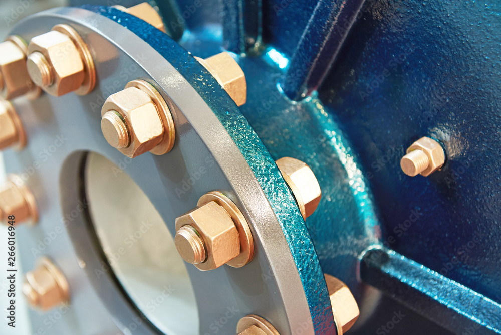 Bolt and nuts in industrial Stock Photo | Adobe Stock