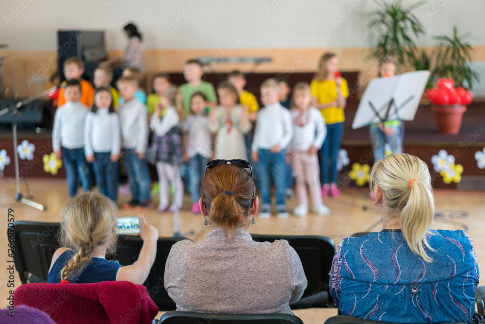 Performance by talented children. Children on stage perform in front of ...
