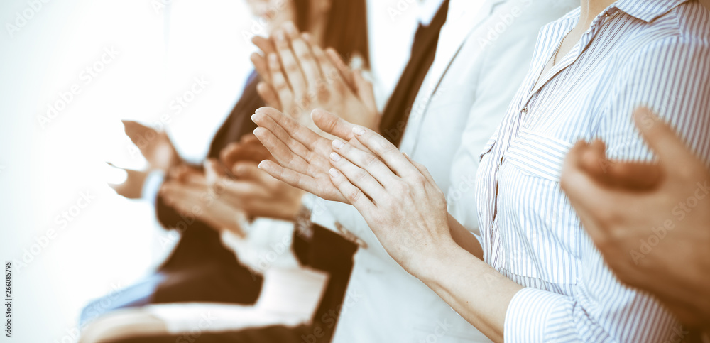Business people clapping and applause at meeting or conference, close ...