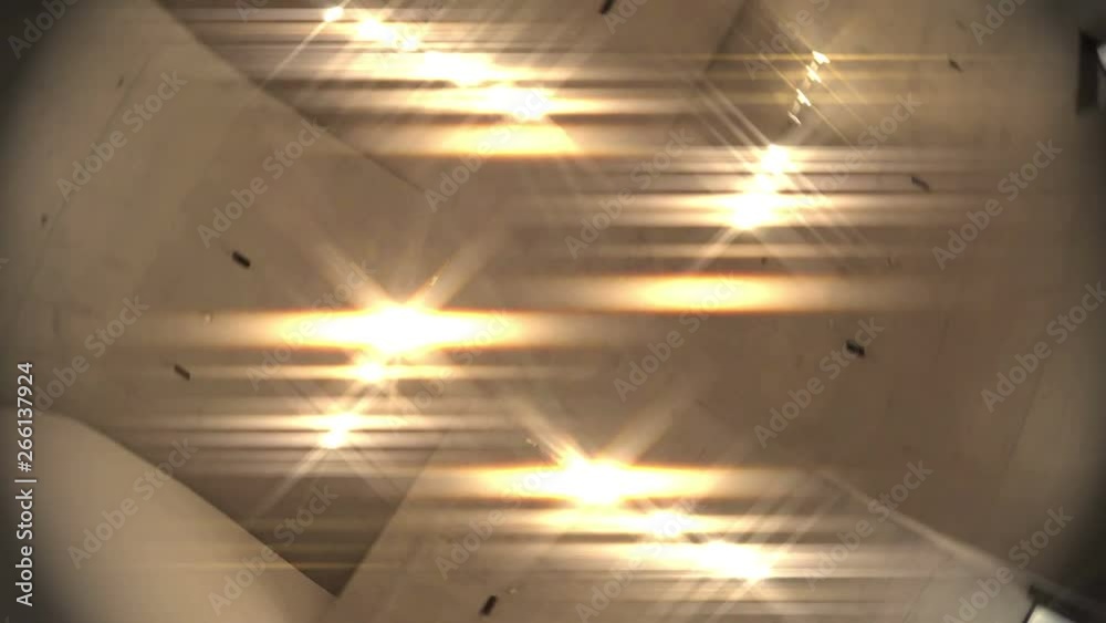 Vidéo Stock Many spinning flaring lights from below. Looking up at ...