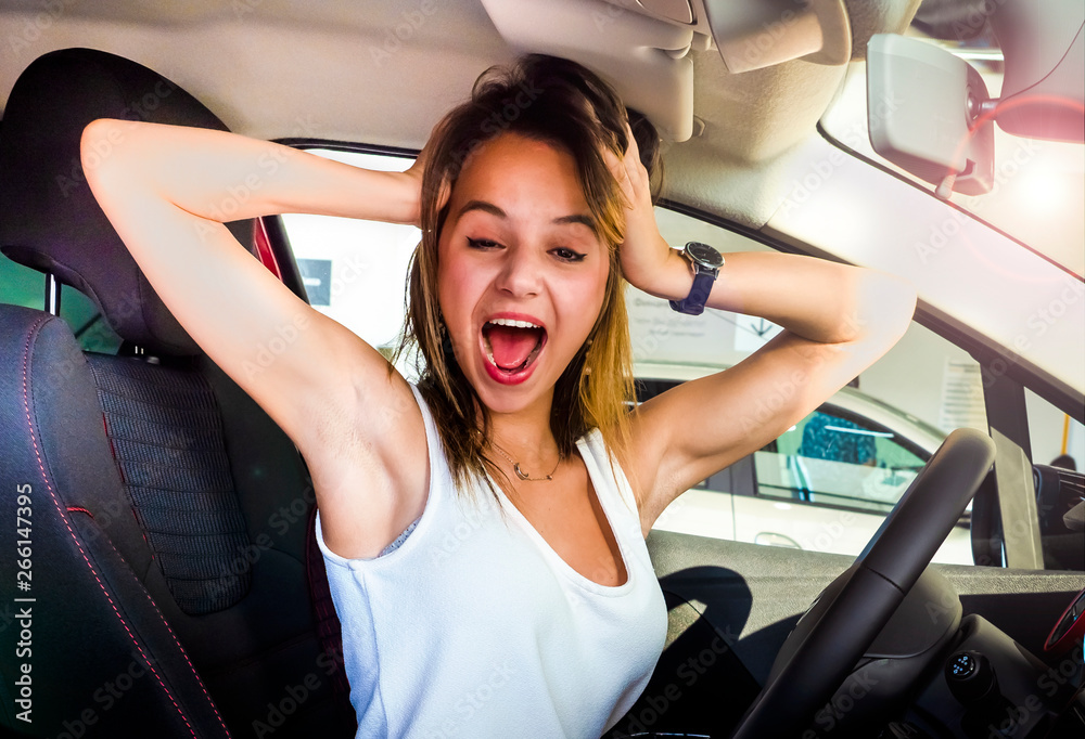 Fright face of woman, driving car. Closeup portrait displeased angry ...