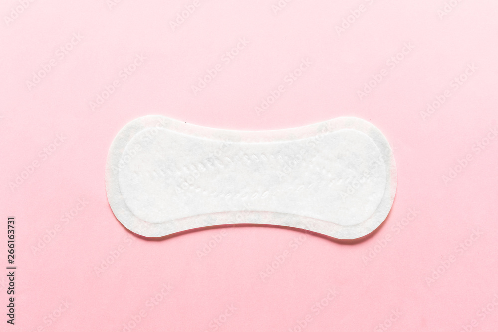 Feminine hygiene pad on a pink background. Concept of feminine hygiene ...