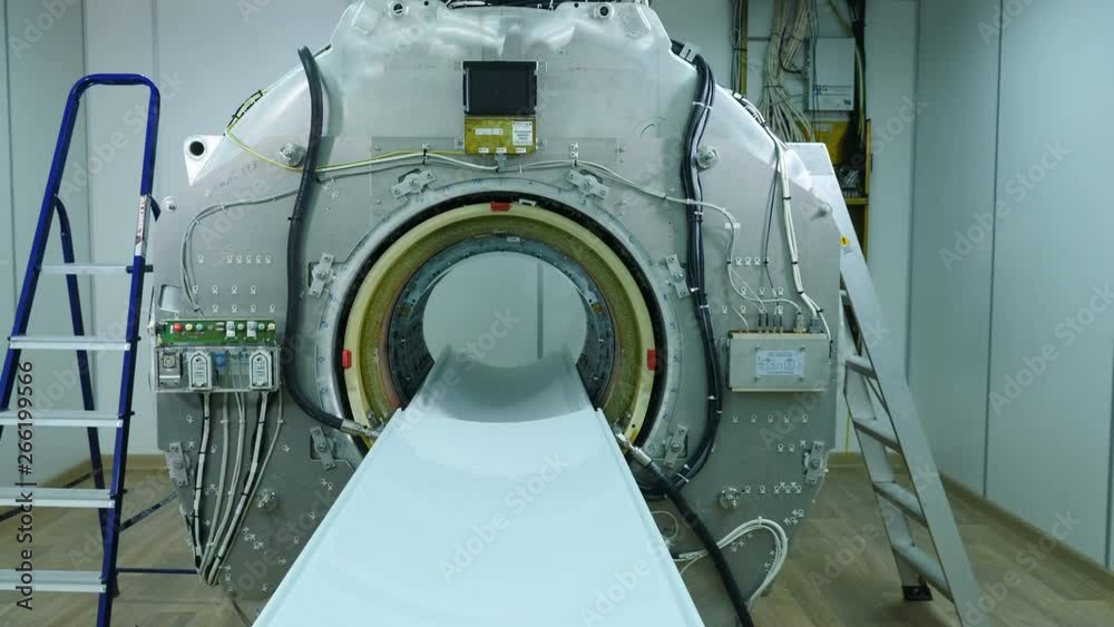 New hospital room improvement with tomograph being installed. An empty ...