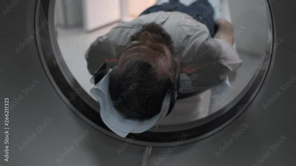 Male Patient On The Ct Or Mri Scanner Machine During X-Ray Process ...