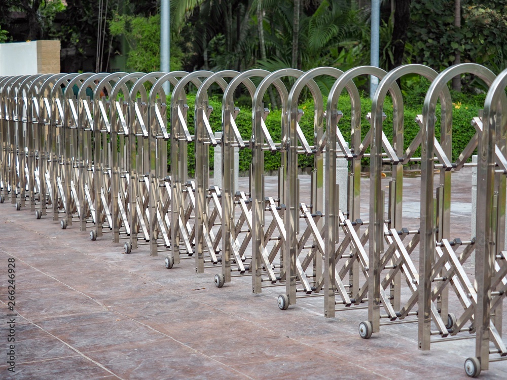 Stainless steel Barrier Gate or folding fence gate with Wheel on cement ...