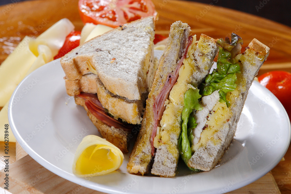 A sandwich club, also called a clubhouse sandwich, is a sandwich of ...