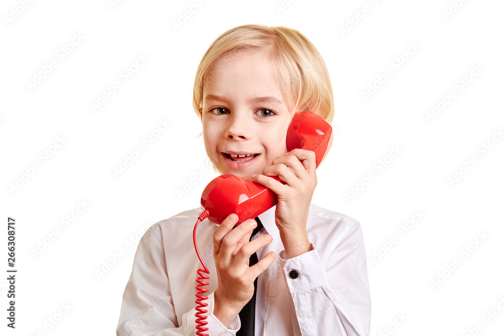 Business Kind mit Telefon beim Telefonieren Stock Photo | Adobe Stock