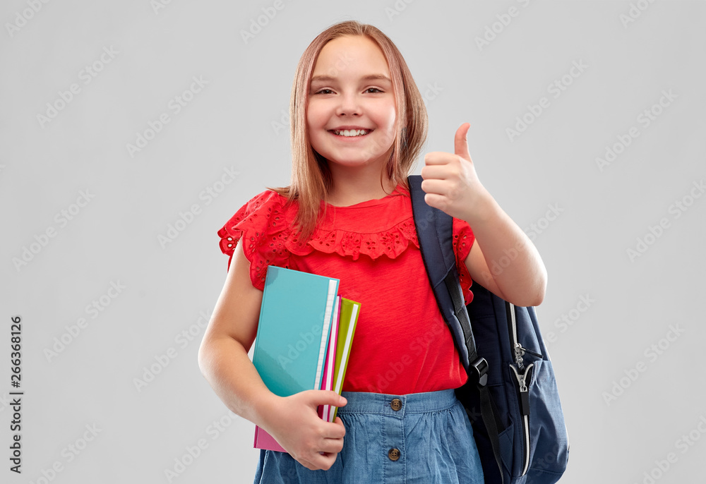 school, education and childhood concept - beautiful smiling student ...