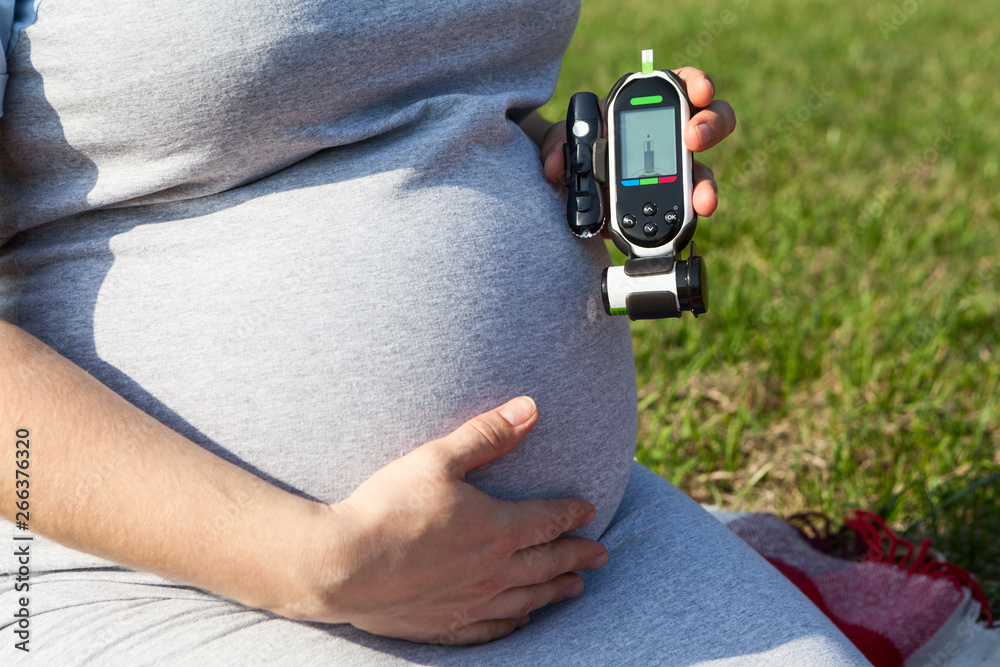 Sugar level measuring with blood glucometer for prevention gestational ...