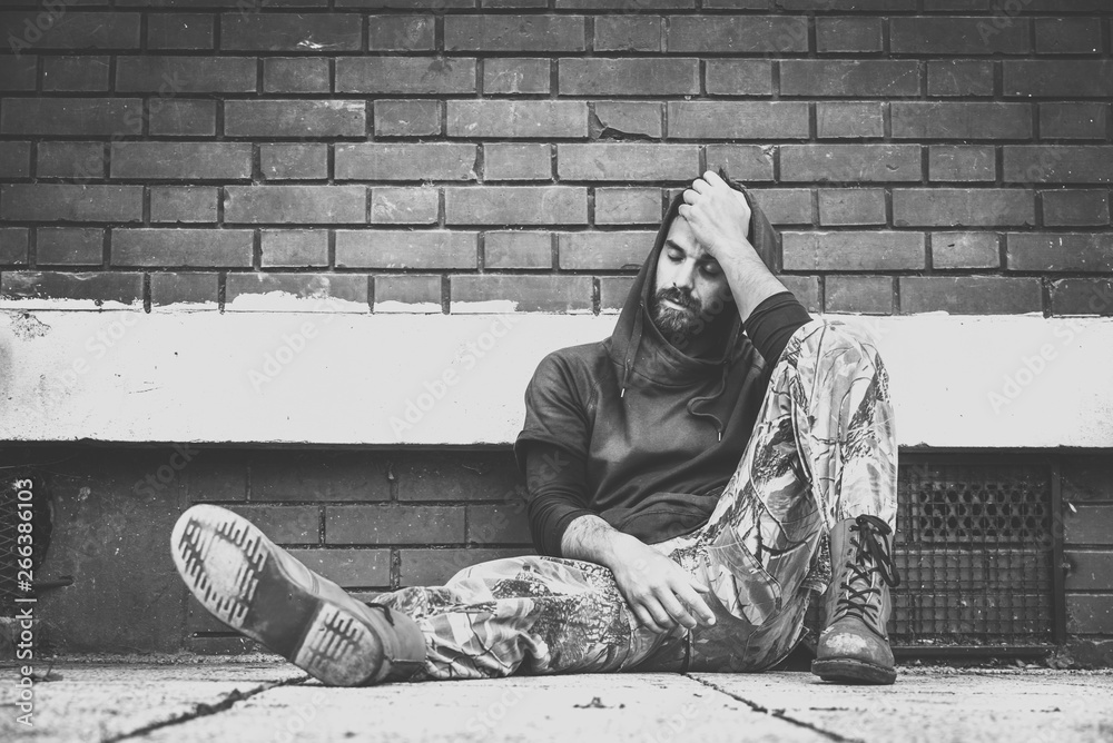 Homeless man, Homeless man drug and alcohol addict sitting alone and ...