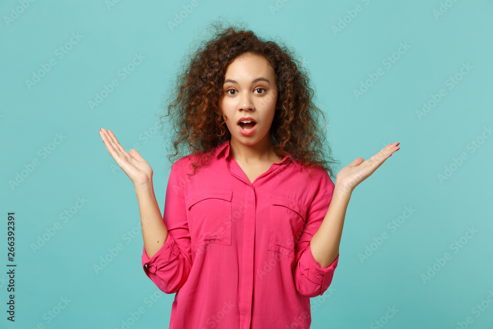 Shocked Amazed African Girl In Casual Clothes Keeping Mouth Open