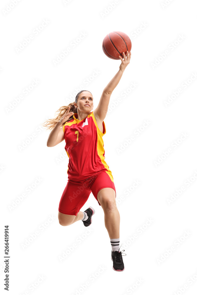 Female basketball player jumping with a ball Stock Photo | Adobe Stock