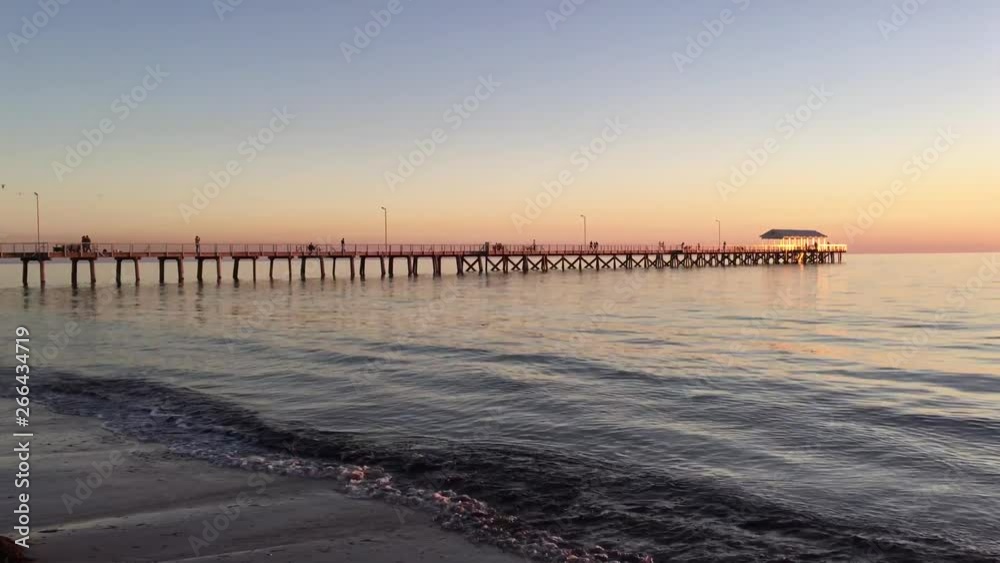 Silhouette of Henley Beach pier at dusk. Henley Beach pier is a very ...
