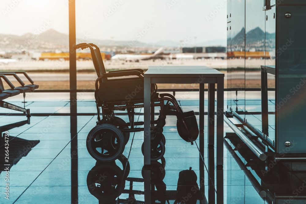 An empty disabled carriage for people with disabilities parked in a ...