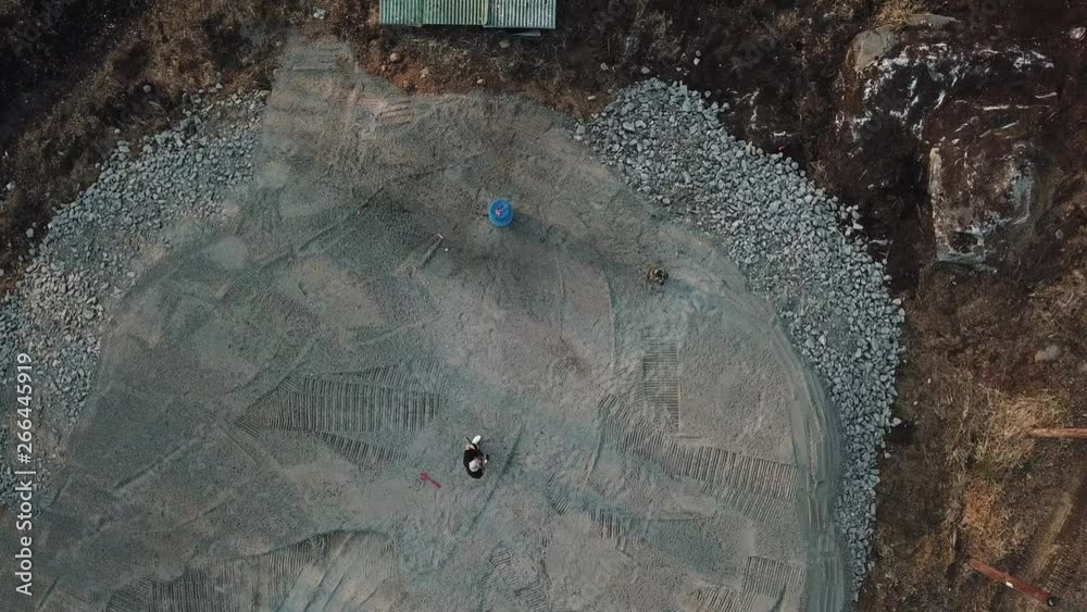 Guy shooting a watermelon with shotgun. Filmed from Drone! vídeo do ...