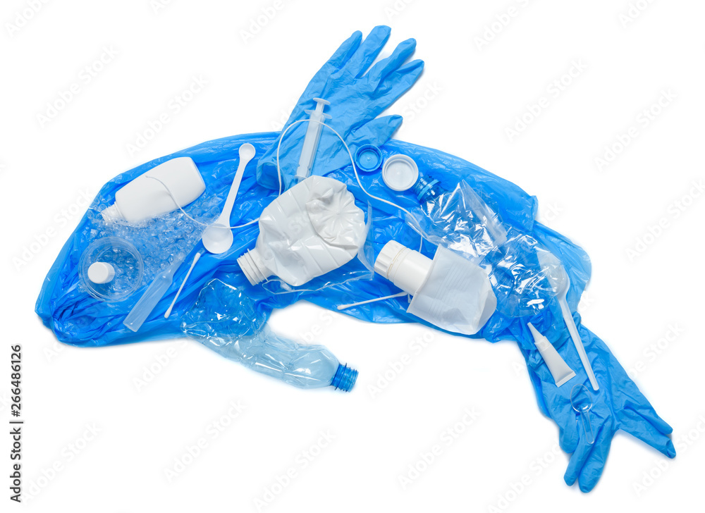 Plastic waste in shape of dolphin isolated on white. Single use ...