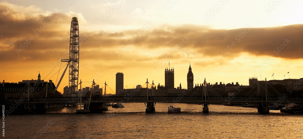 London Skyline at sunset, silhouette of The Palace of Westminster and ...