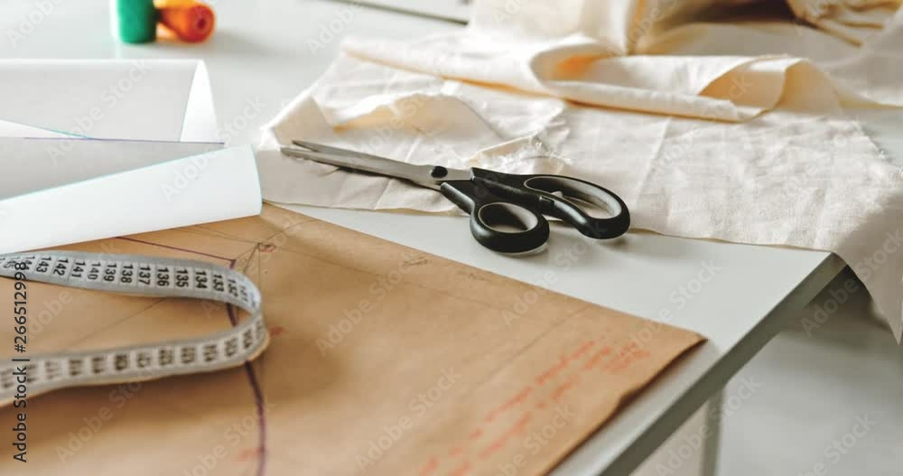 Fashion designer desk with equipment, tailoring and sewing workshop ...