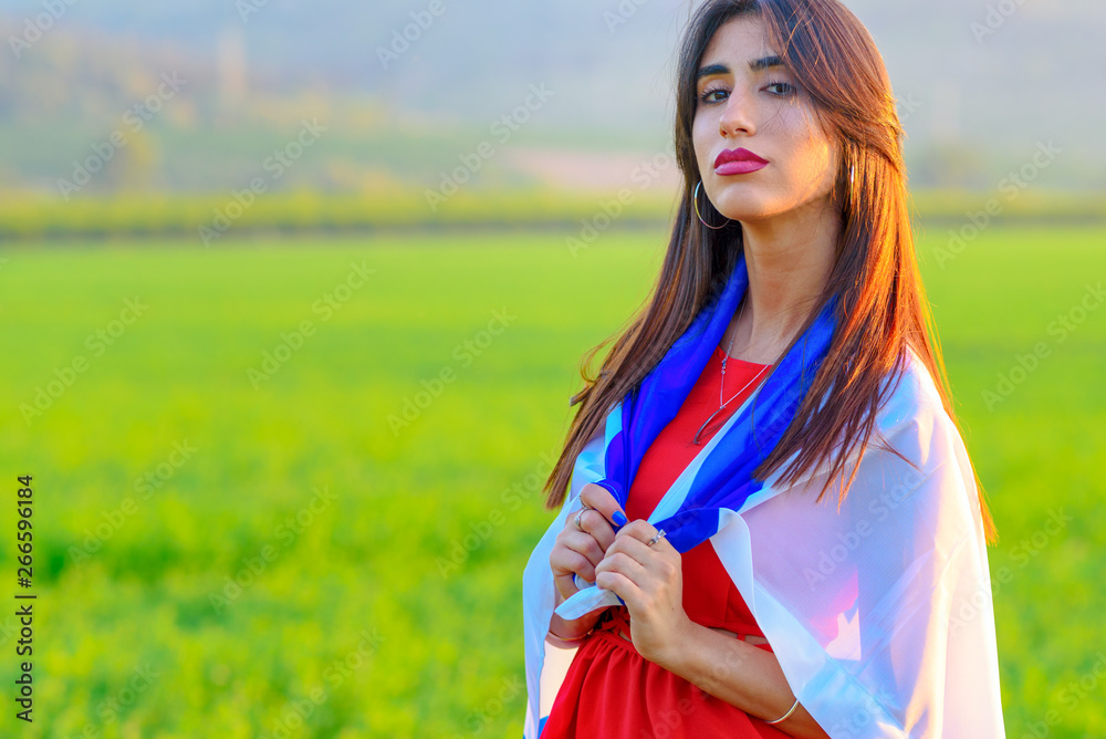Portrait Young israeli woman patriot jewish proud girl wrapped flag of ...