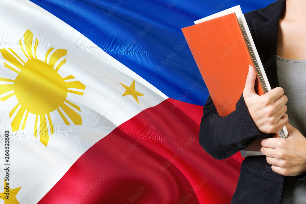 Learning Filipino language concept. Young woman standing with the ...